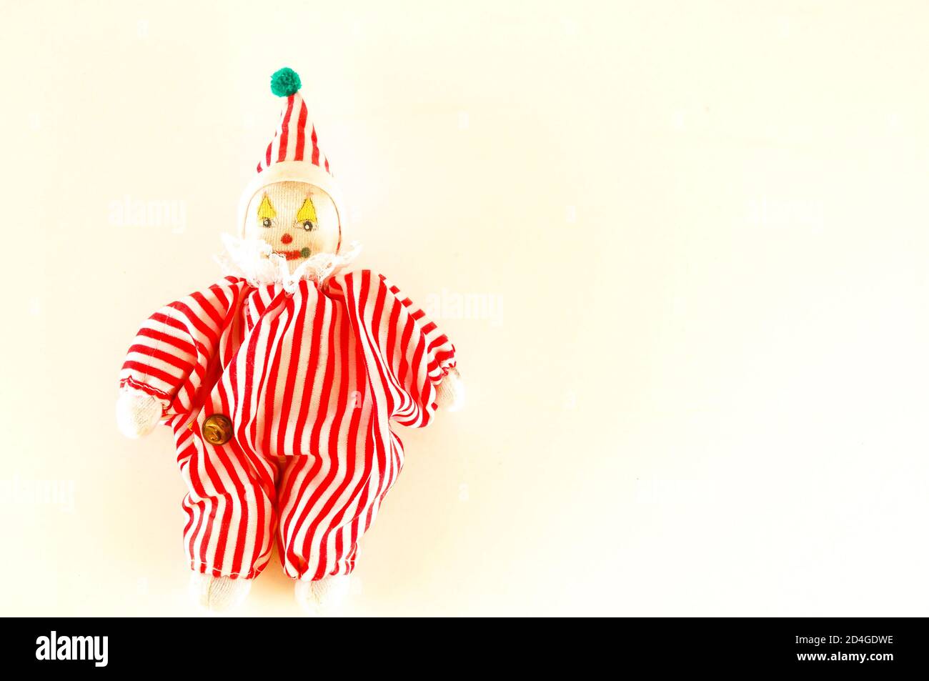 Pierrot toy doll on white background Stock Photo - Alamy