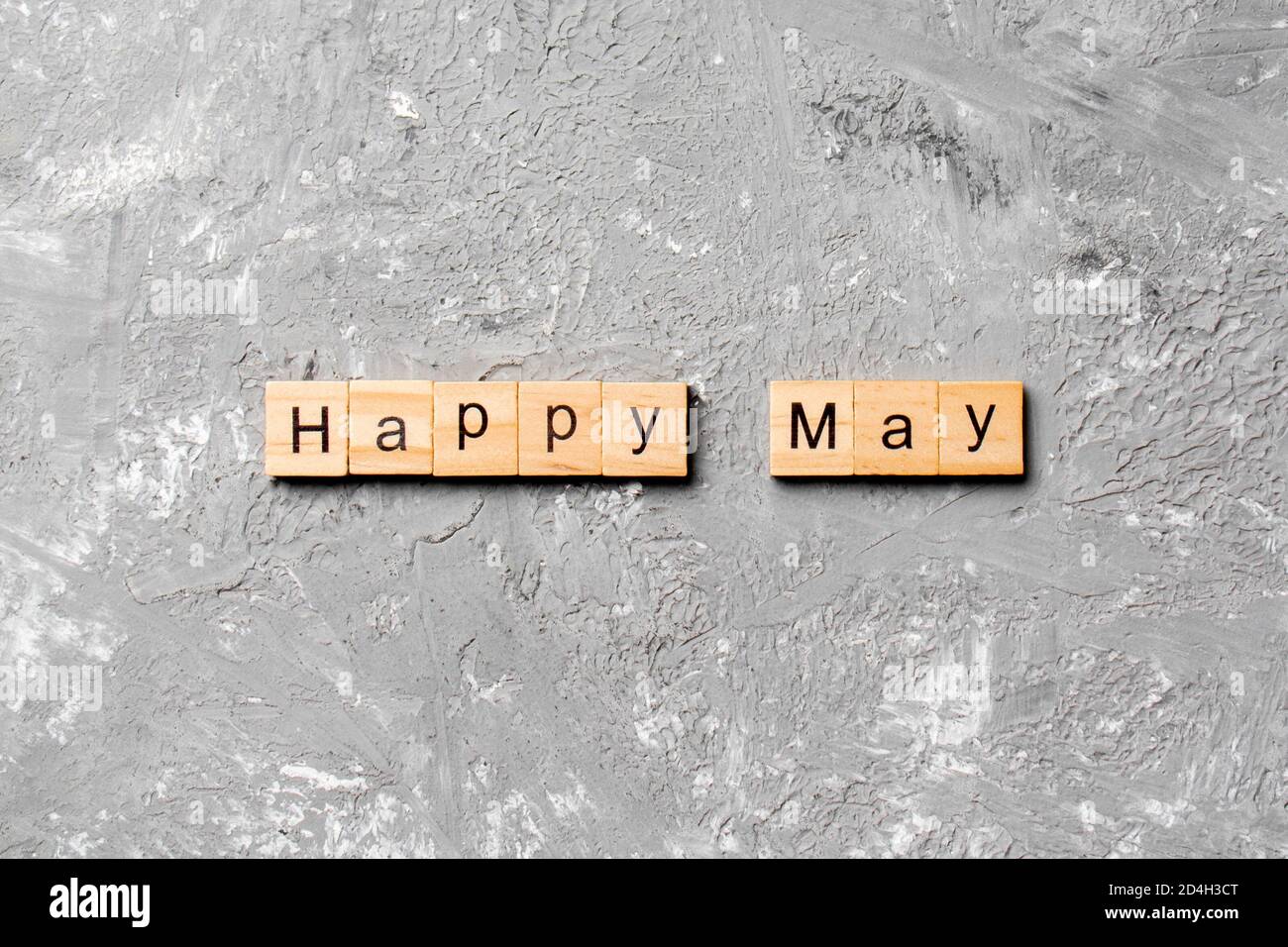 Happy May word written on wood block. Happy May text on table, concept ...