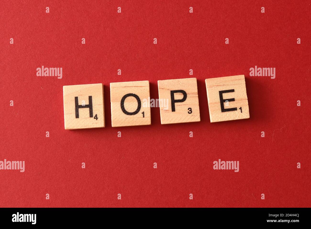 Hope spelt out using scrabble style tiles Stock Photo - Alamy
