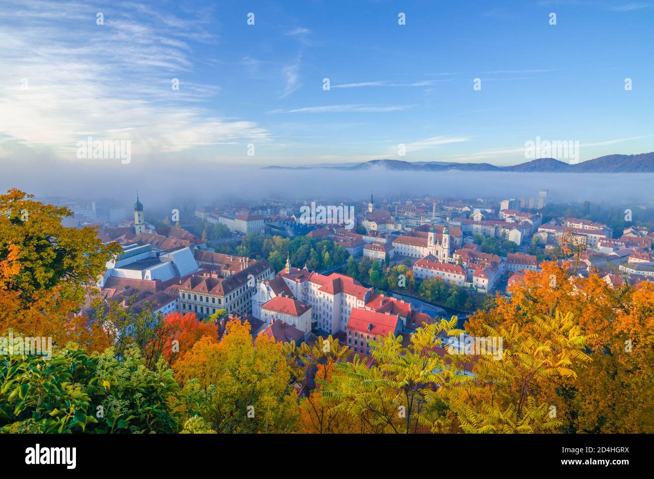Cityscape of Graz with Mur river and Mariahilfer church ...