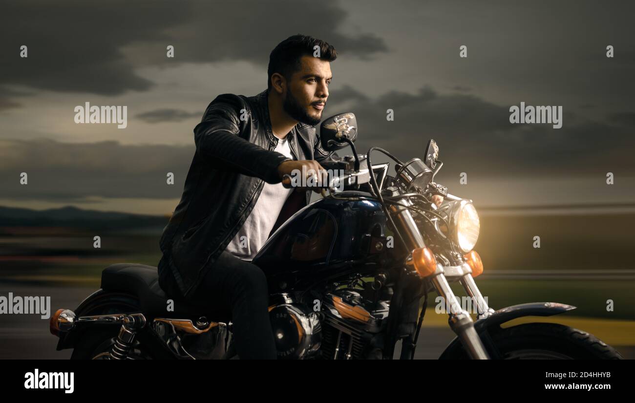 Male driving a motorcycle Stock Photo - Alamy