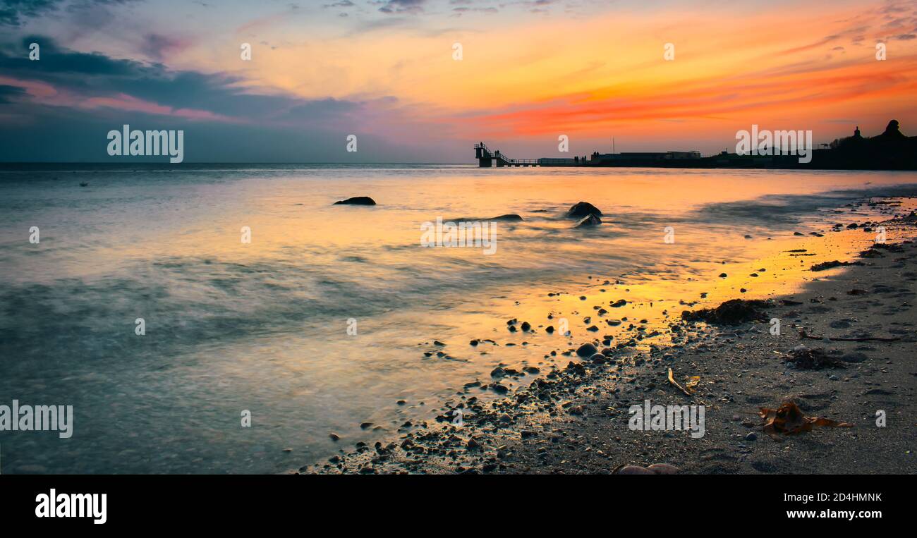 Sunset at Salthill beach in Galway, Ireland Stock Photo - Alamy