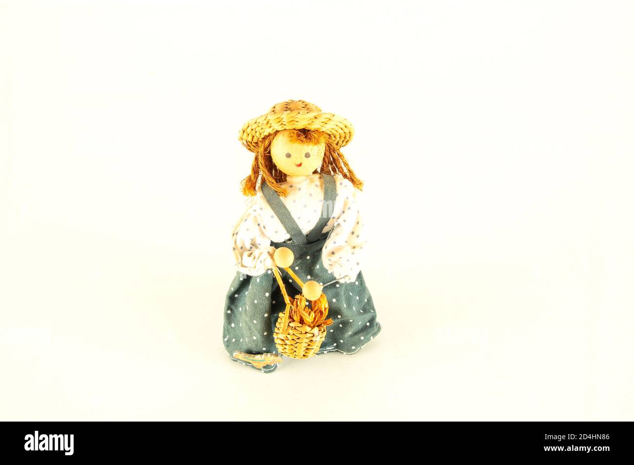 Pierrot toy doll on white background Stock Photo - Alamy