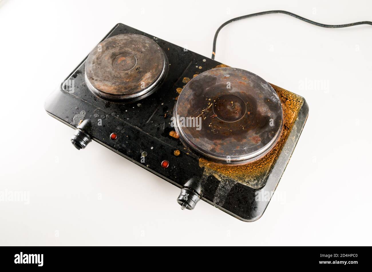 Portable electric cooker isolated on white Stock Photo - Alamy