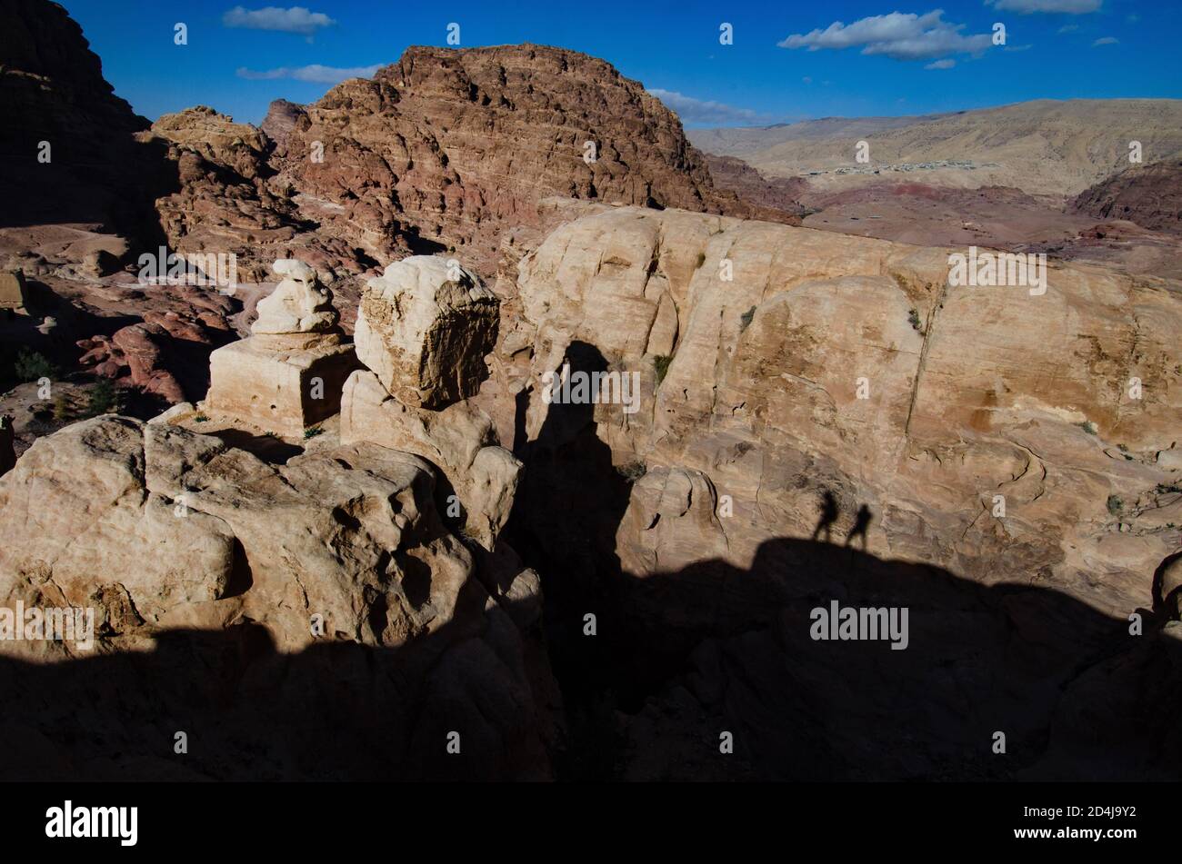 Shadows of people at the Snakes Head Monument, Petra hiking trail.Petra ...