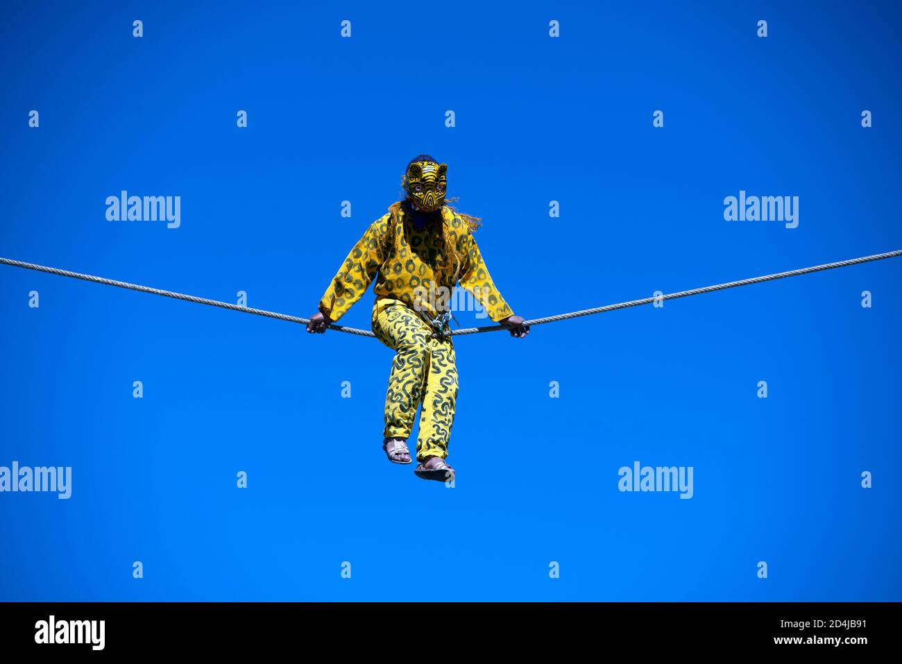 A Mayan circus acrobat on a high wire at the 2013 Ruk'u'x festival in ...