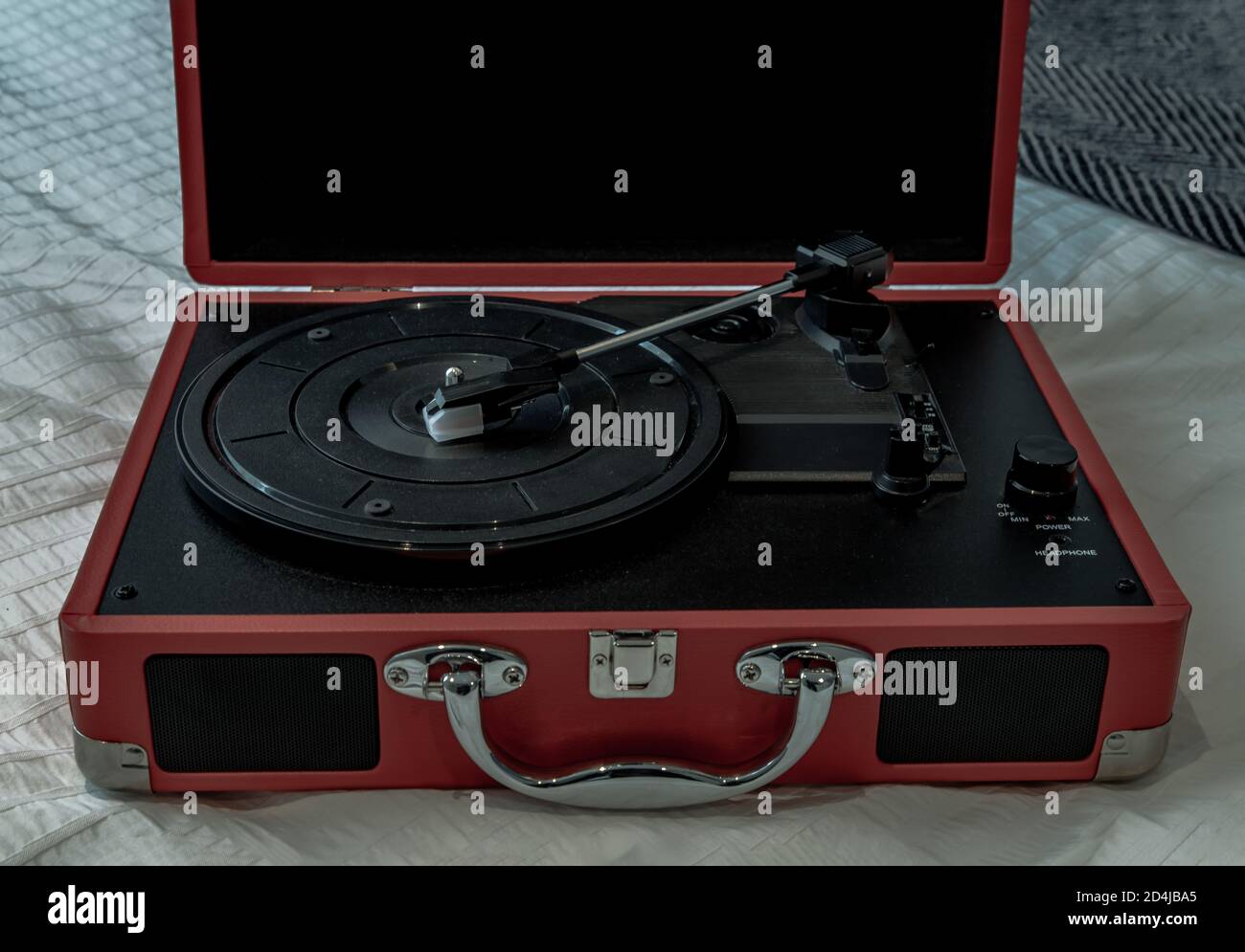 Portable turntable on white bed. Focus and blur Stock Photo - Alamy
