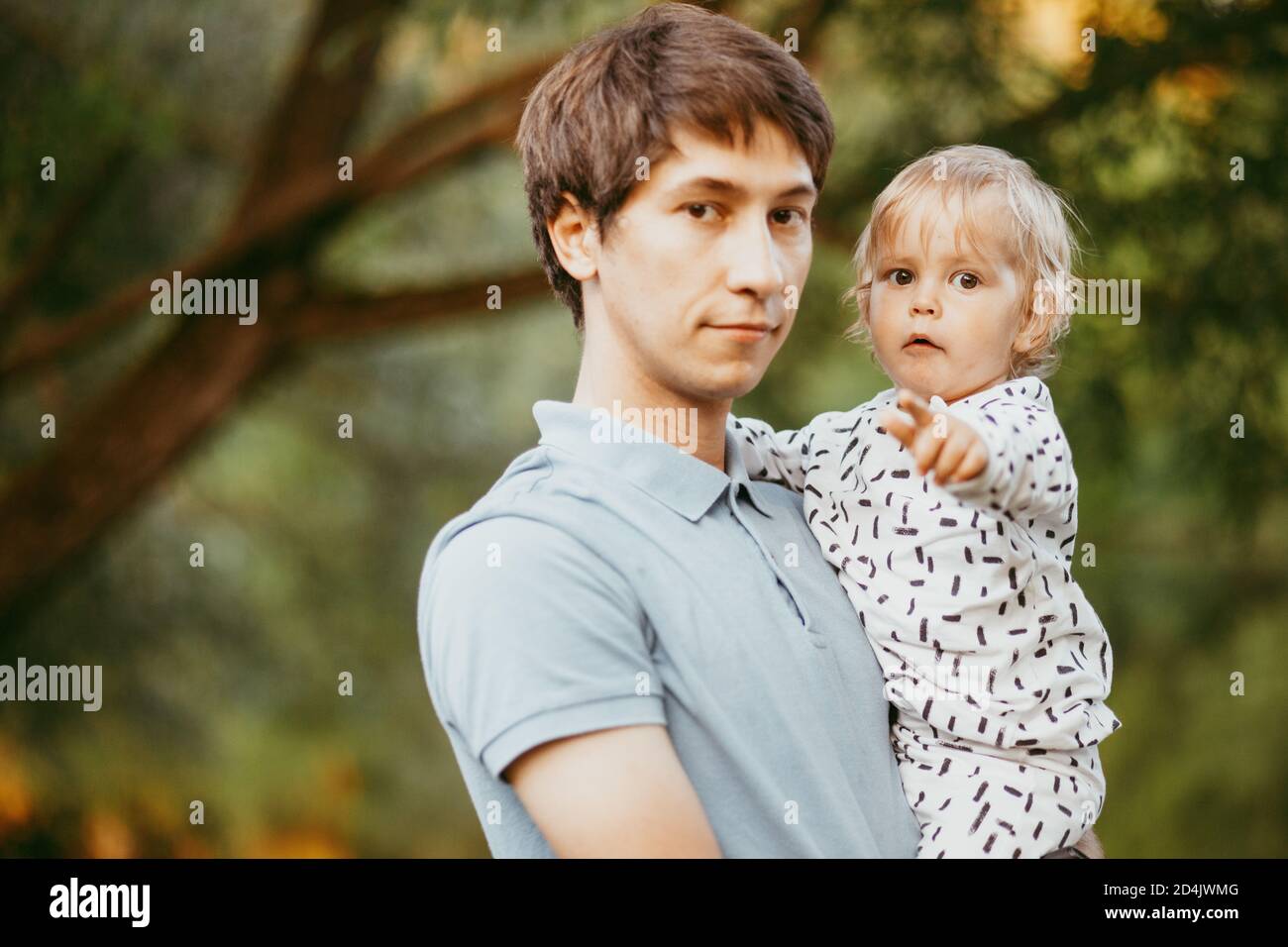 happy family father and son walking in nature Stock Photo - Alamy