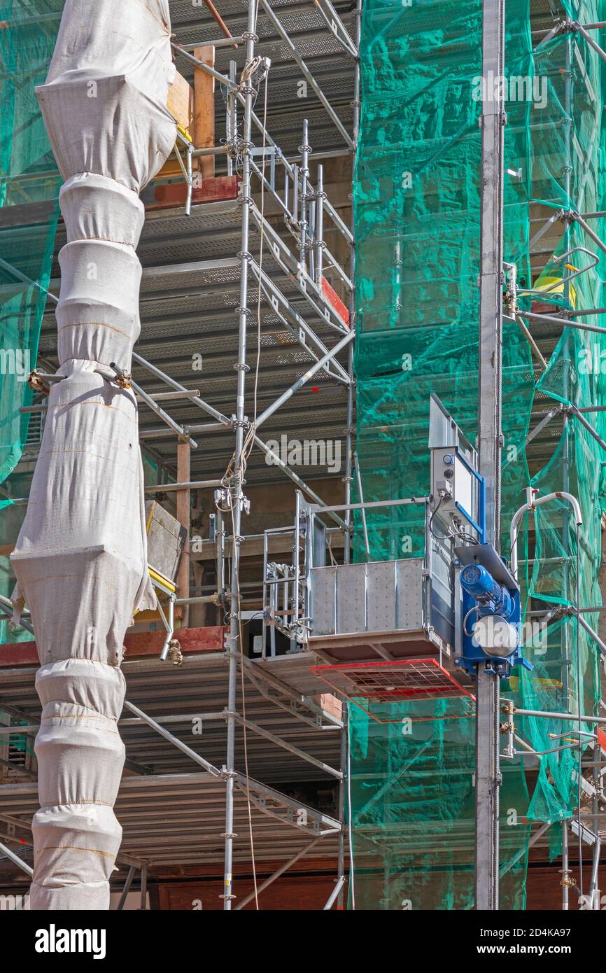 Chute Tube and Elevator at Construction Site Scaffoldings Stock Photo ...