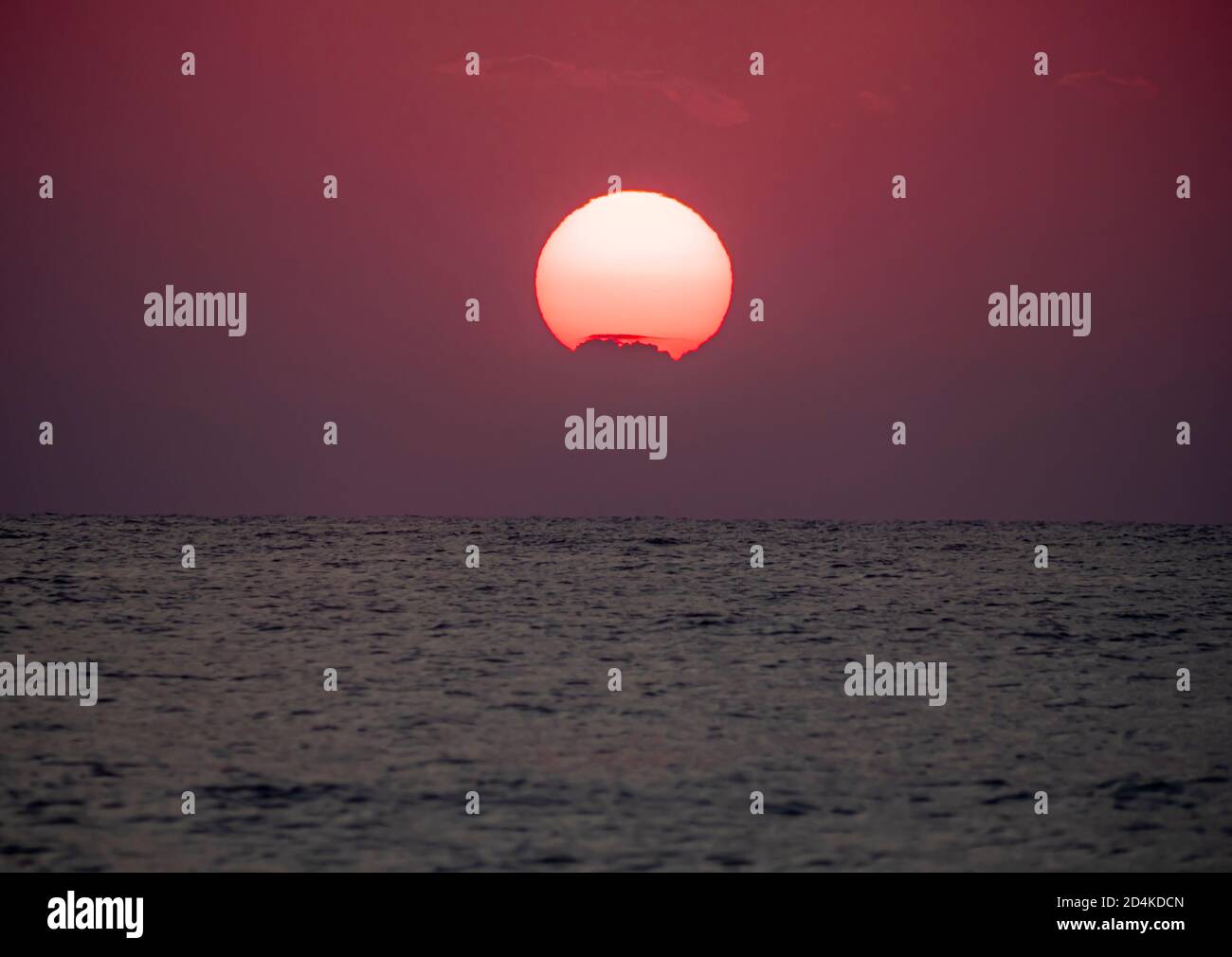 big sun down over sea sunrise, red sky Stock Photo - Alamy