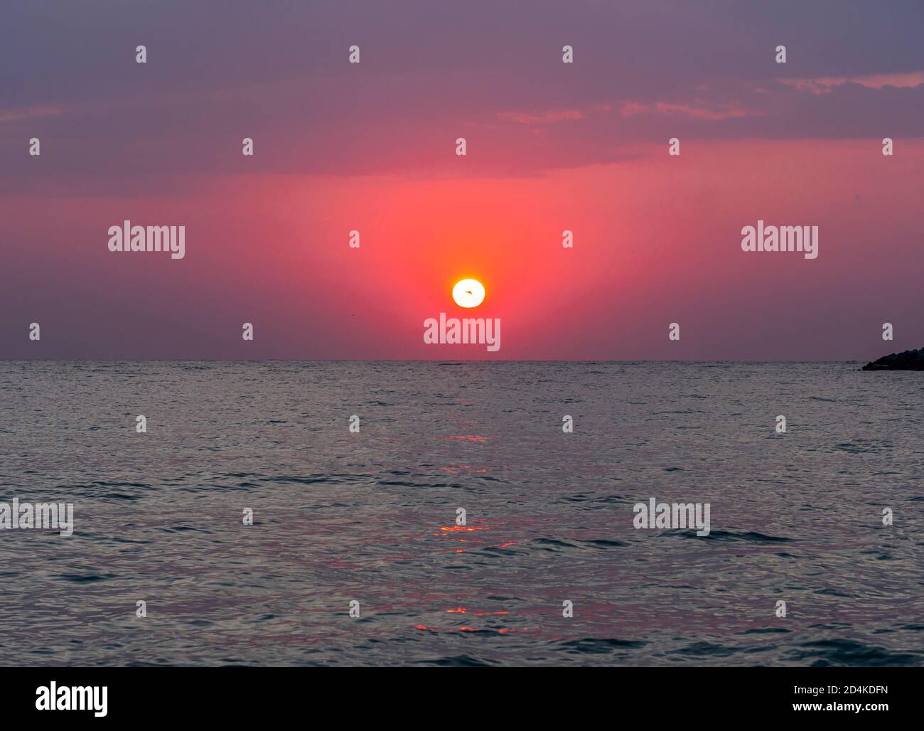 big sun down over sea sunrise, red sky Stock Photo - Alamy