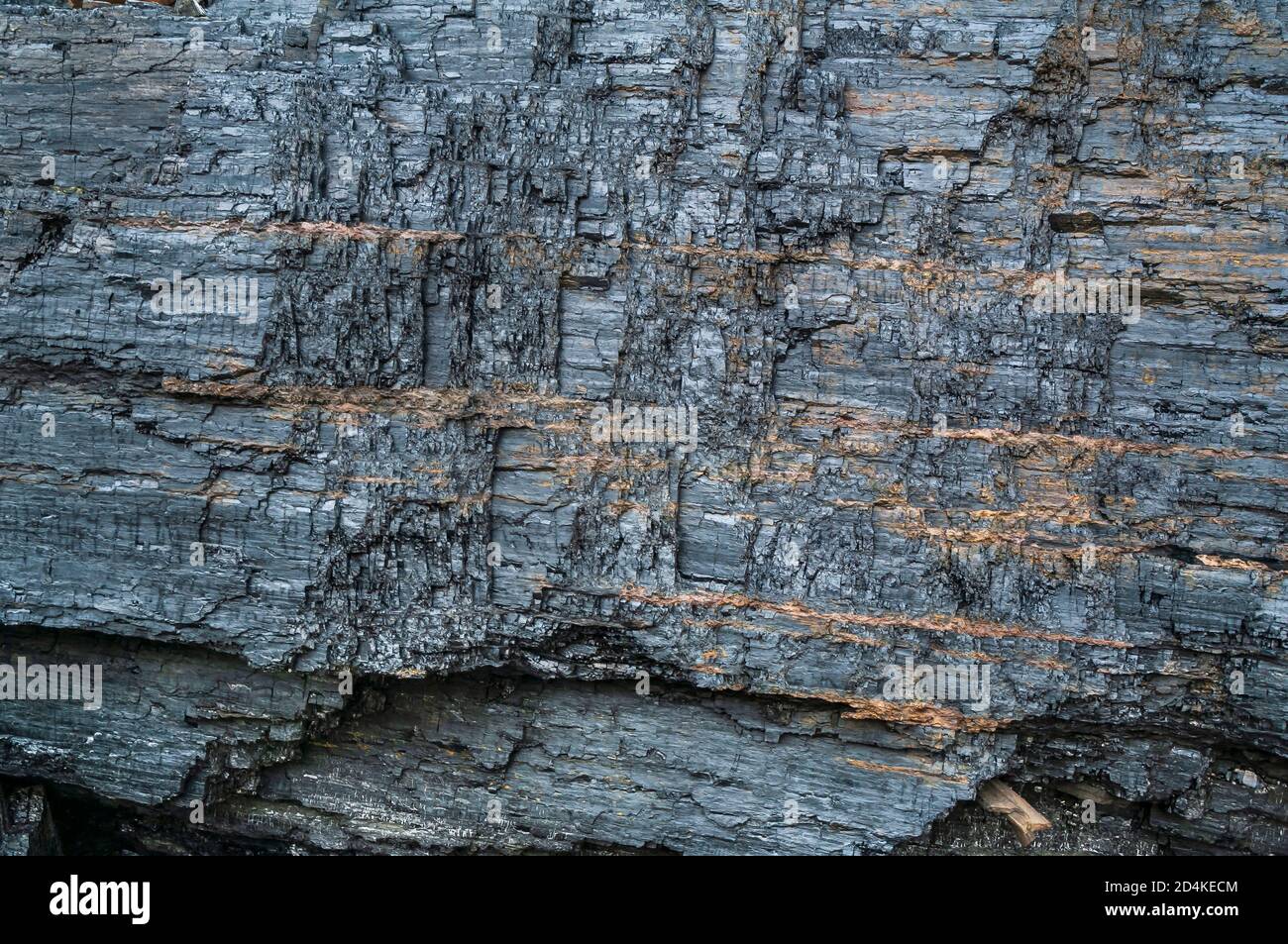 Large shiny blocks of coal with dirt bands removed from the face in an ...