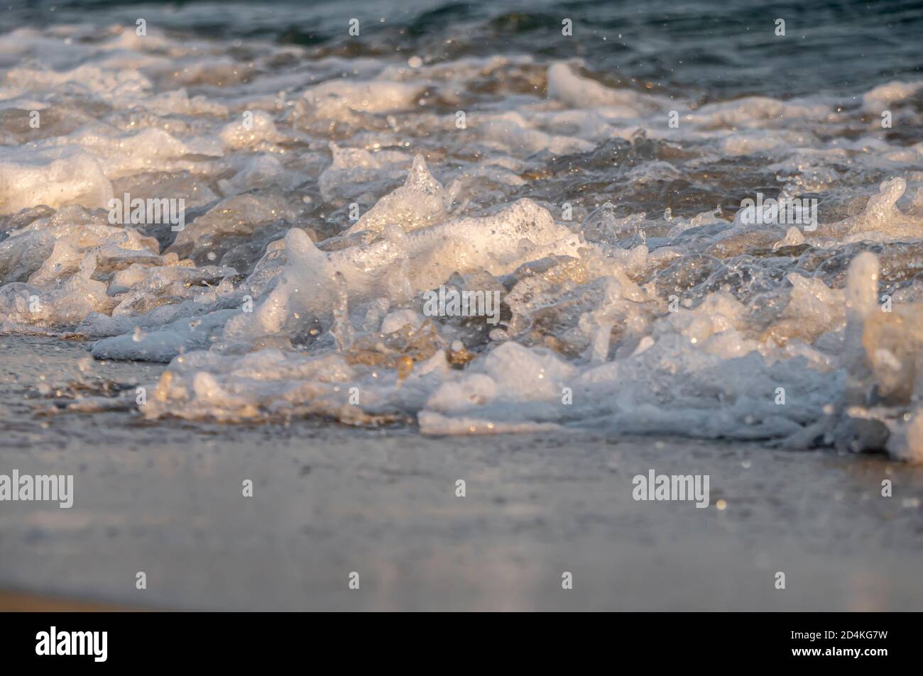 wave splash sea beach macro, close up Stock Photo - Alamy