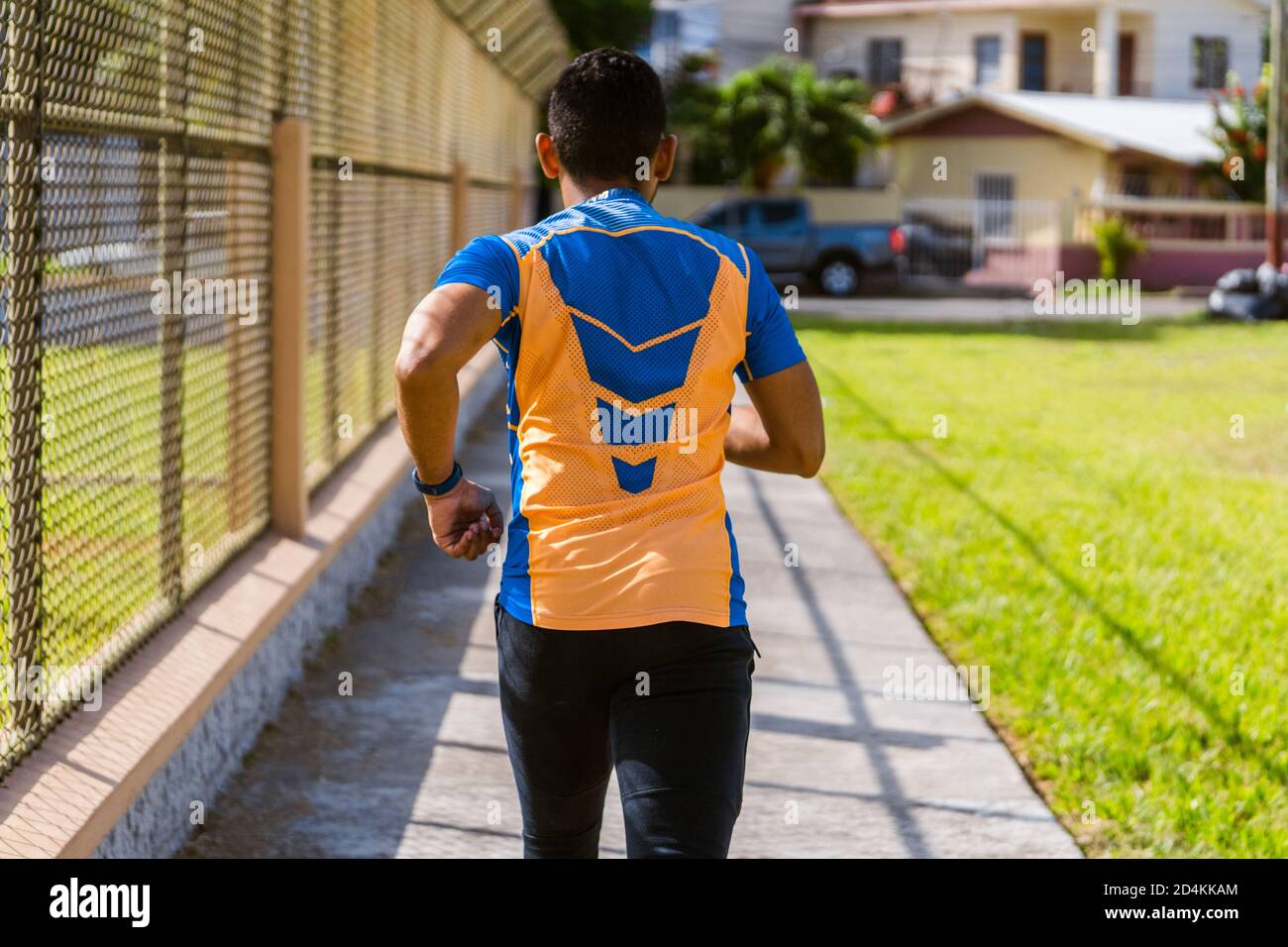 Back view male athlete hi-res stock photography and images - Alamy