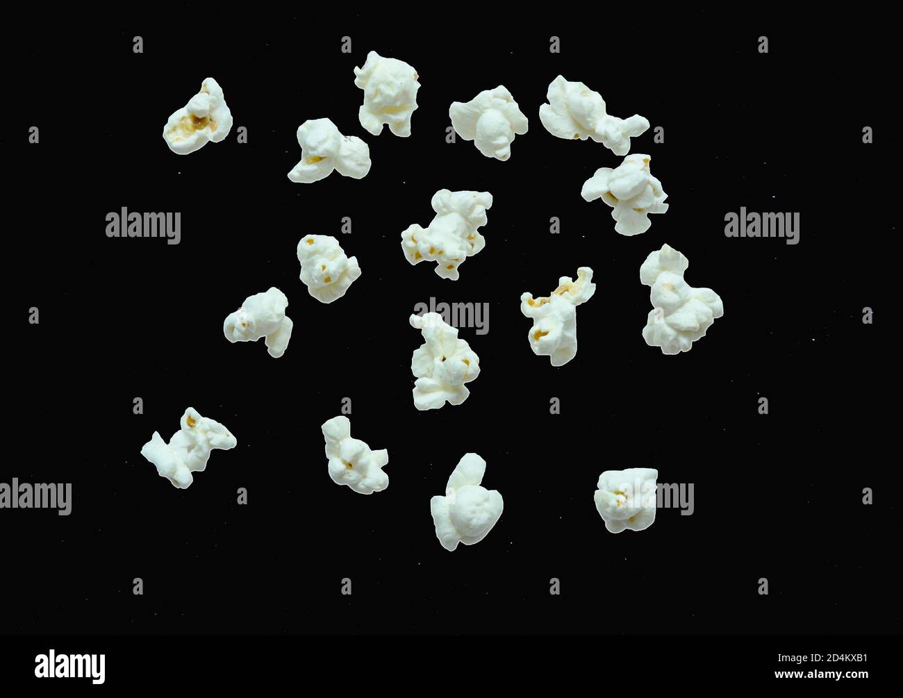 salty popcorn floating on night sky background Stock Photo - Alamy