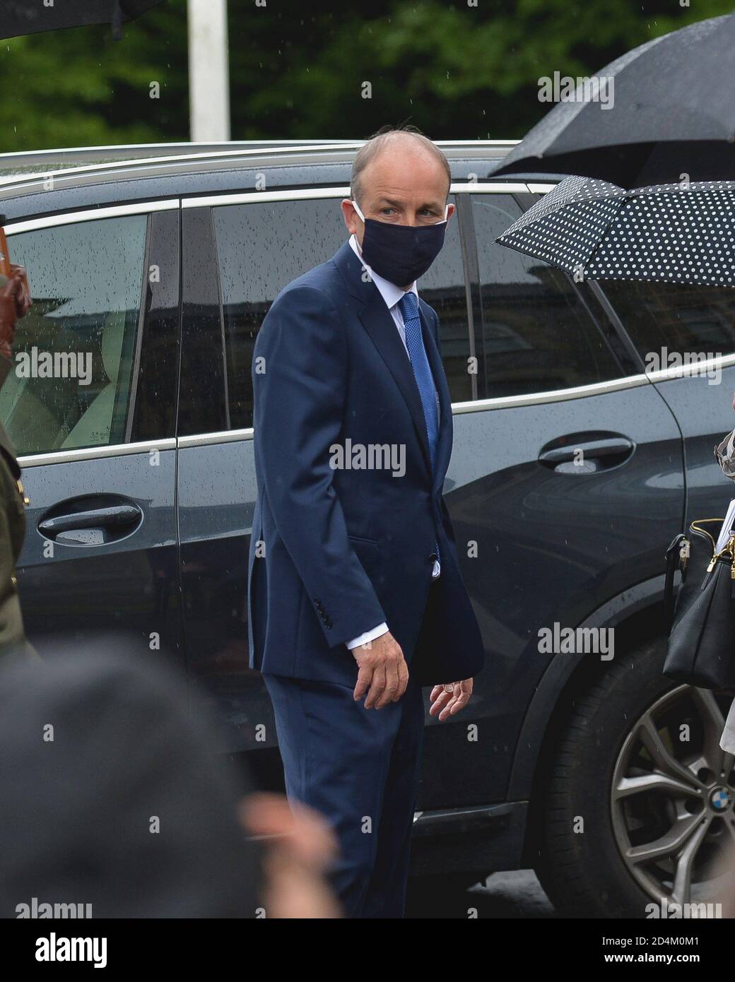 Irish Taoiseach Micheál Martin wearing a face mask at the funeral of ...