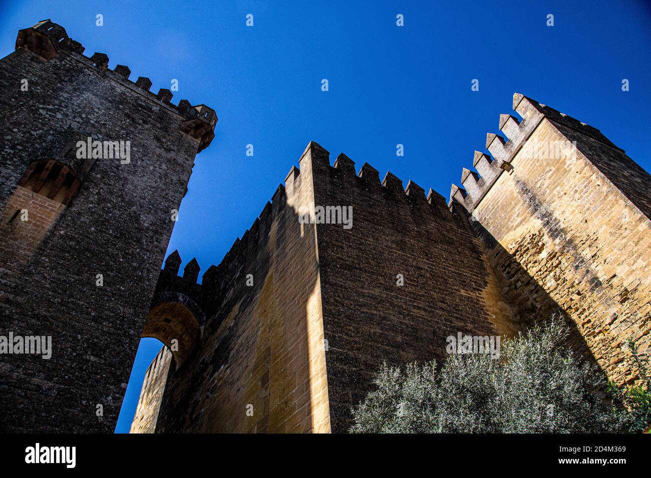 Square towers of castle wall with walkway Stock Photo - Alamy