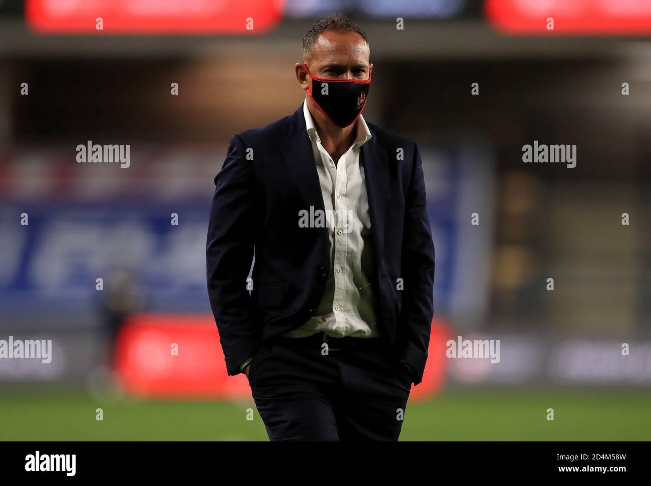 Wigan Warriors' Head Coach Adrian Lam inspects the pitch prior to start ...