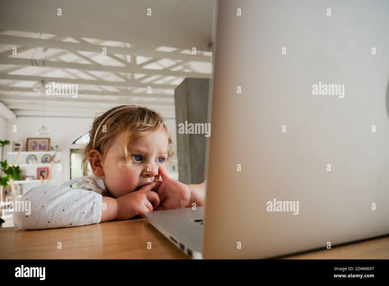 Toddler at computer hi-res stock photography and images - Alamy