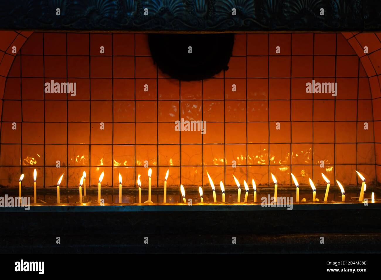 burning the candle at church. candle burning ritual, sacrament ...