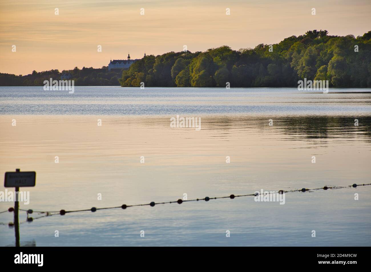 View to Plon castle from beach of Fegetasche, big ploner lake ...