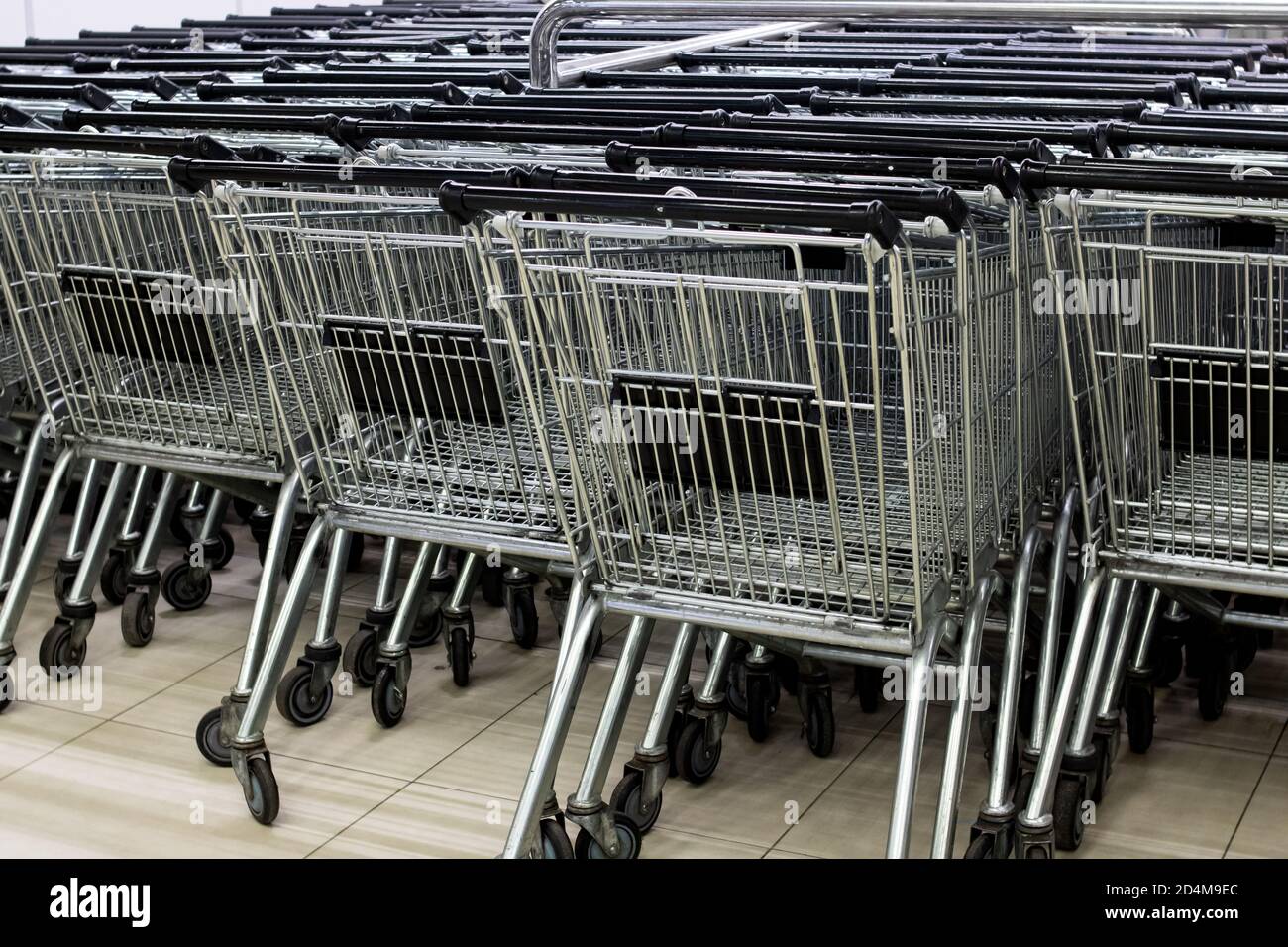Many shopping cart on the sidewalk closeup Stock Photo - Alamy
