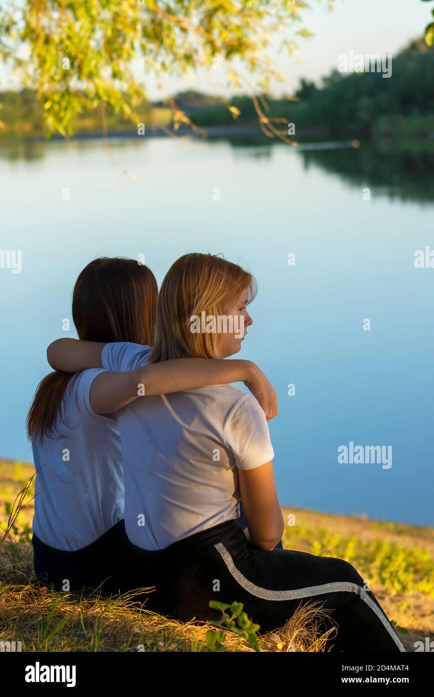 Happy women hugging each other hi-res stock photography and images - Alamy