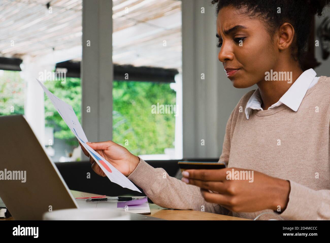Woman alone reading card hi-res stock photography and images - Alamy