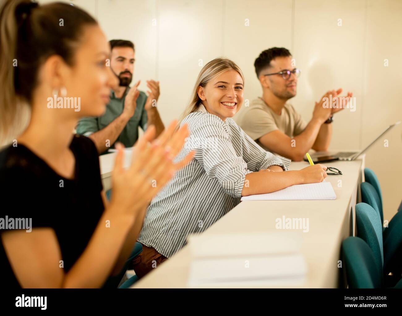 Group of university students in the classroom Stock Photo - Alamy