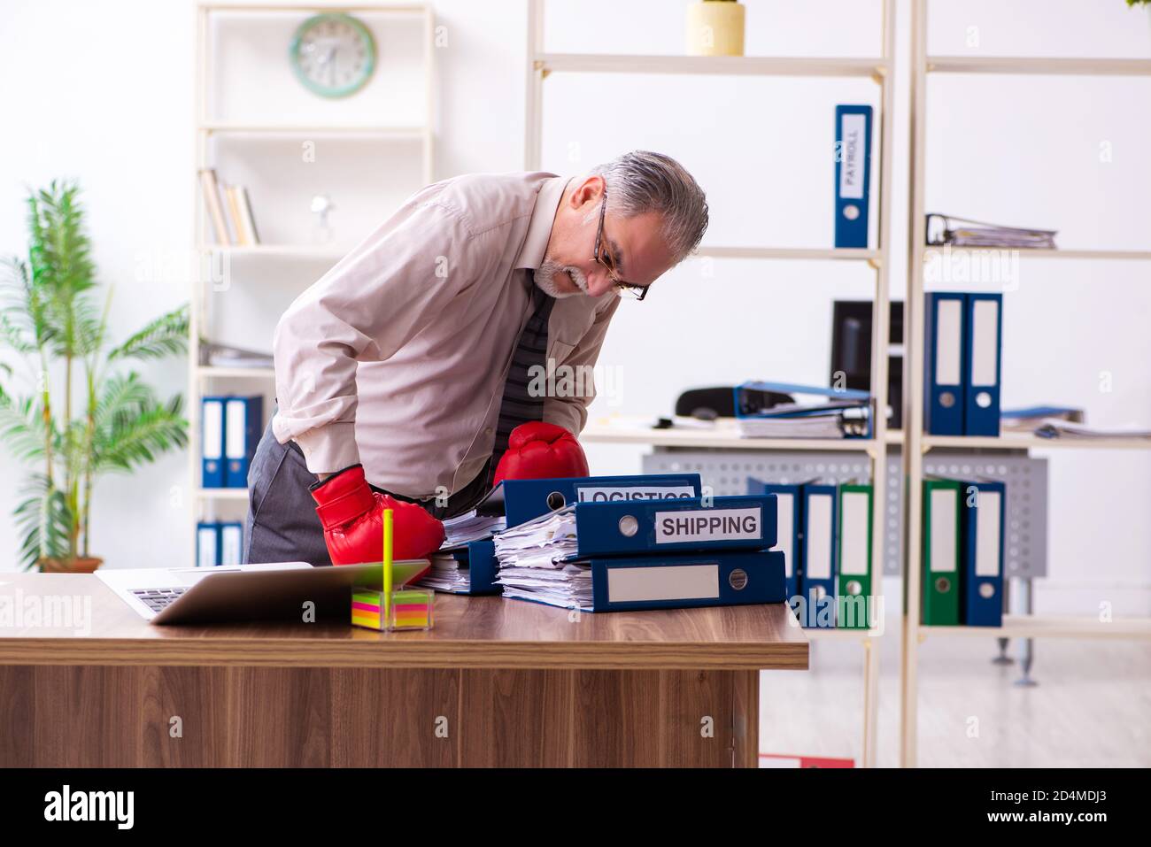 Businessman angry and furious at his workplace Stock Photo - Alamy