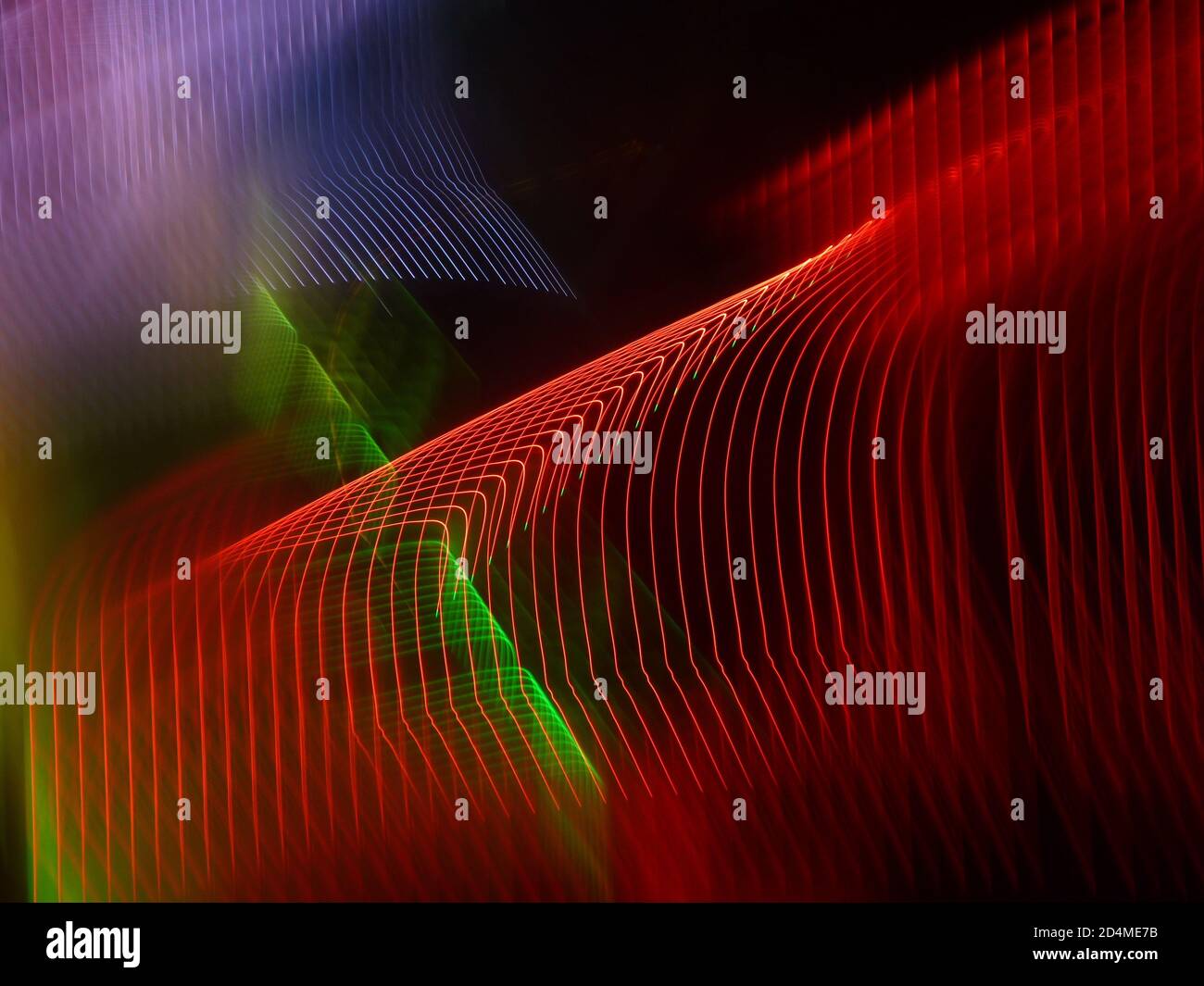 Colorful background with red light streaks Stock Photo - Alamy