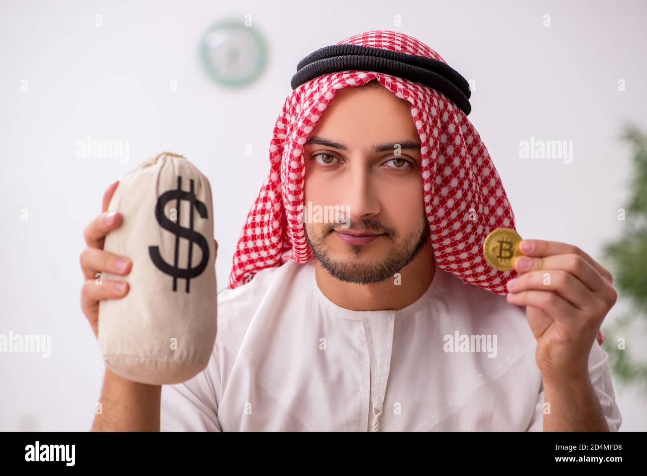 Male arab employee working in the office Stock Photo - Alamy