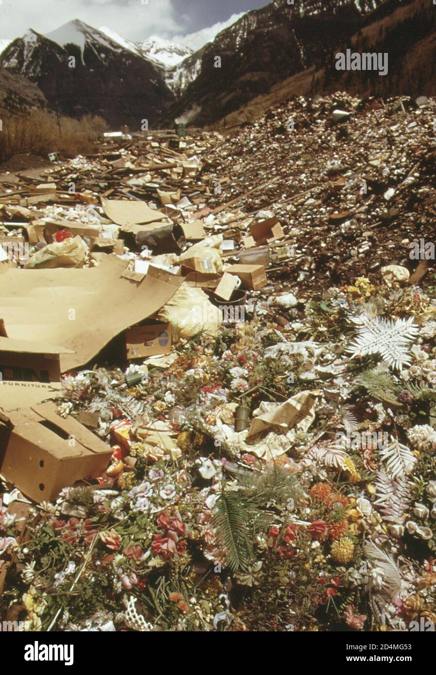 Open dump near the San Juan Mountains. The San Miguel River flows past ...