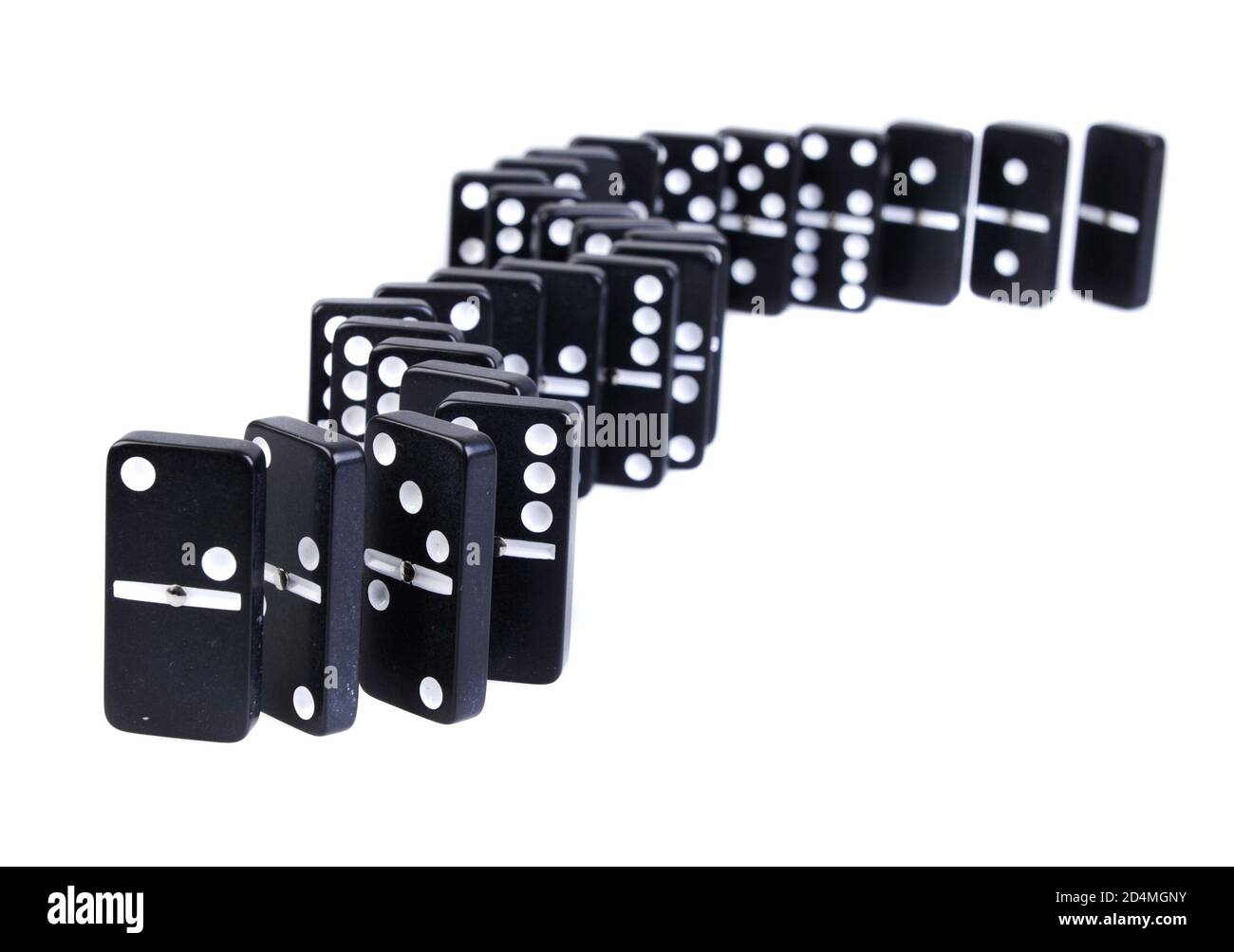 Line of domino tiles leading to infinity. Isolated on white Stock Photo ...
