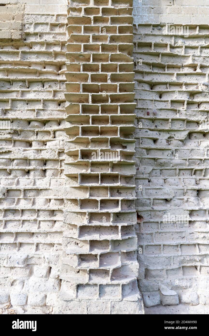 Old dilapidated white brick wall. Old wall in a dilapidated house ...