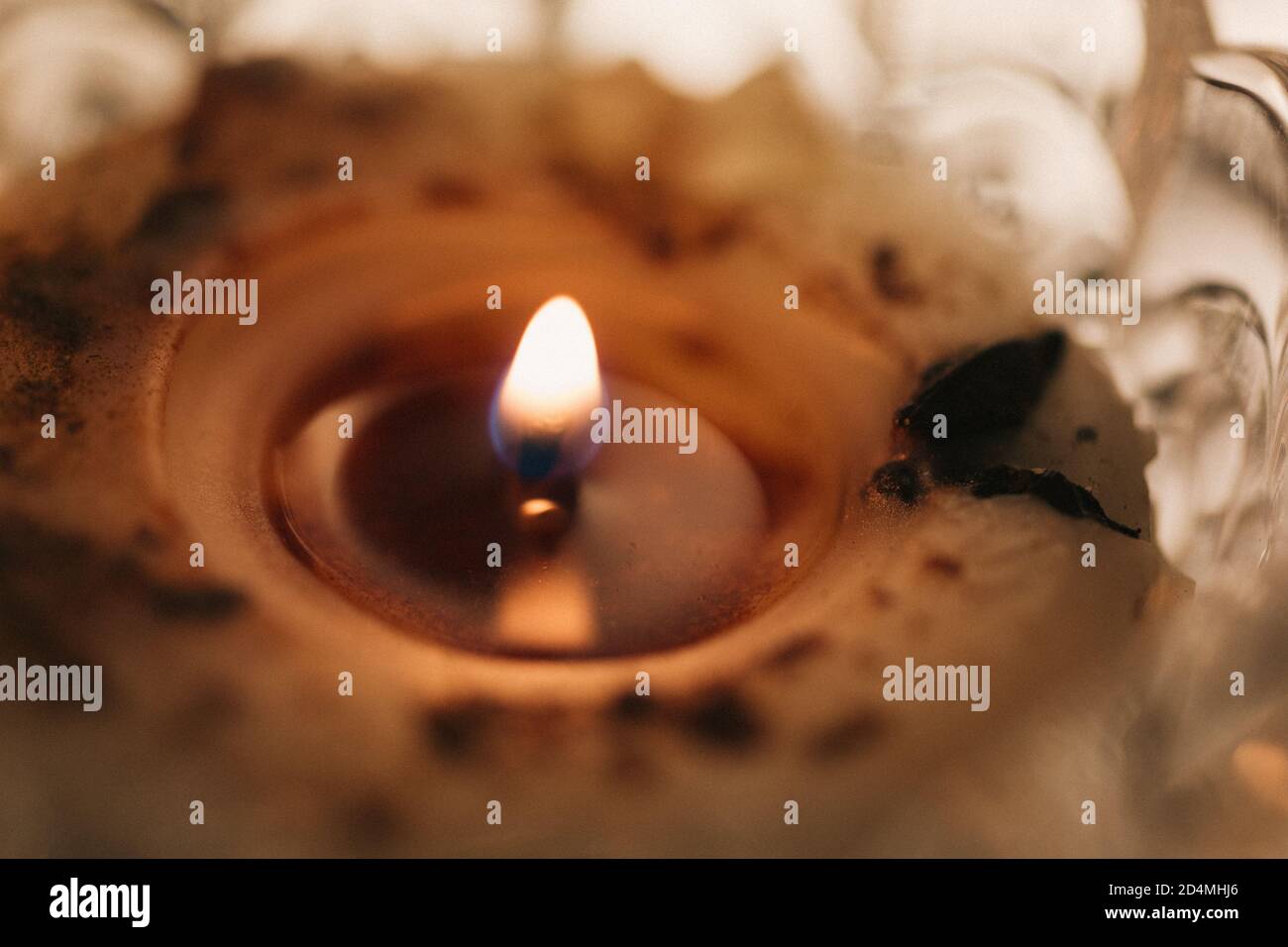 Closeup shot of a small flame on a burning candle Stock Photo - Alamy