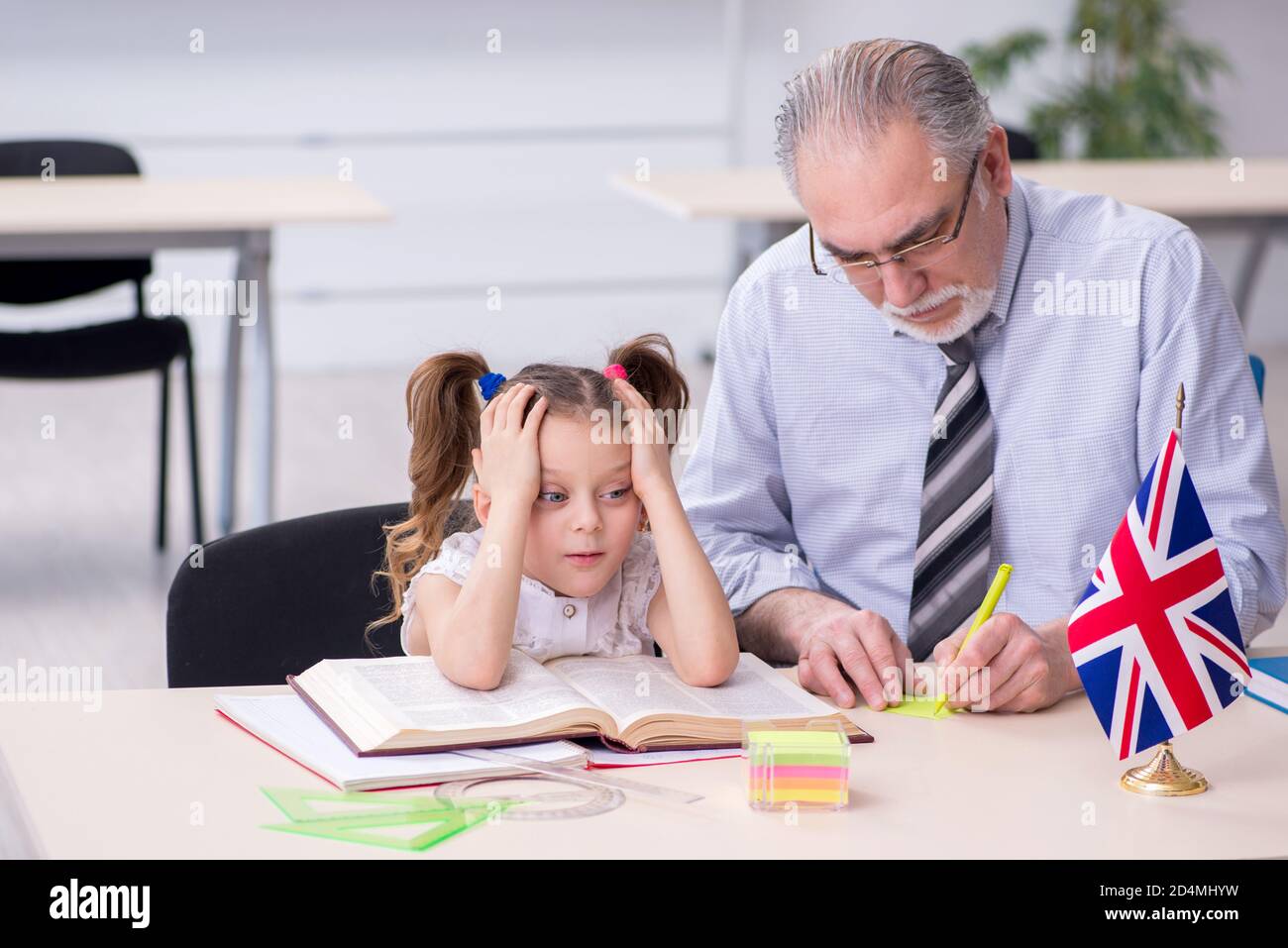 Primary school student girl teacher uk hi-res stock photography and ...