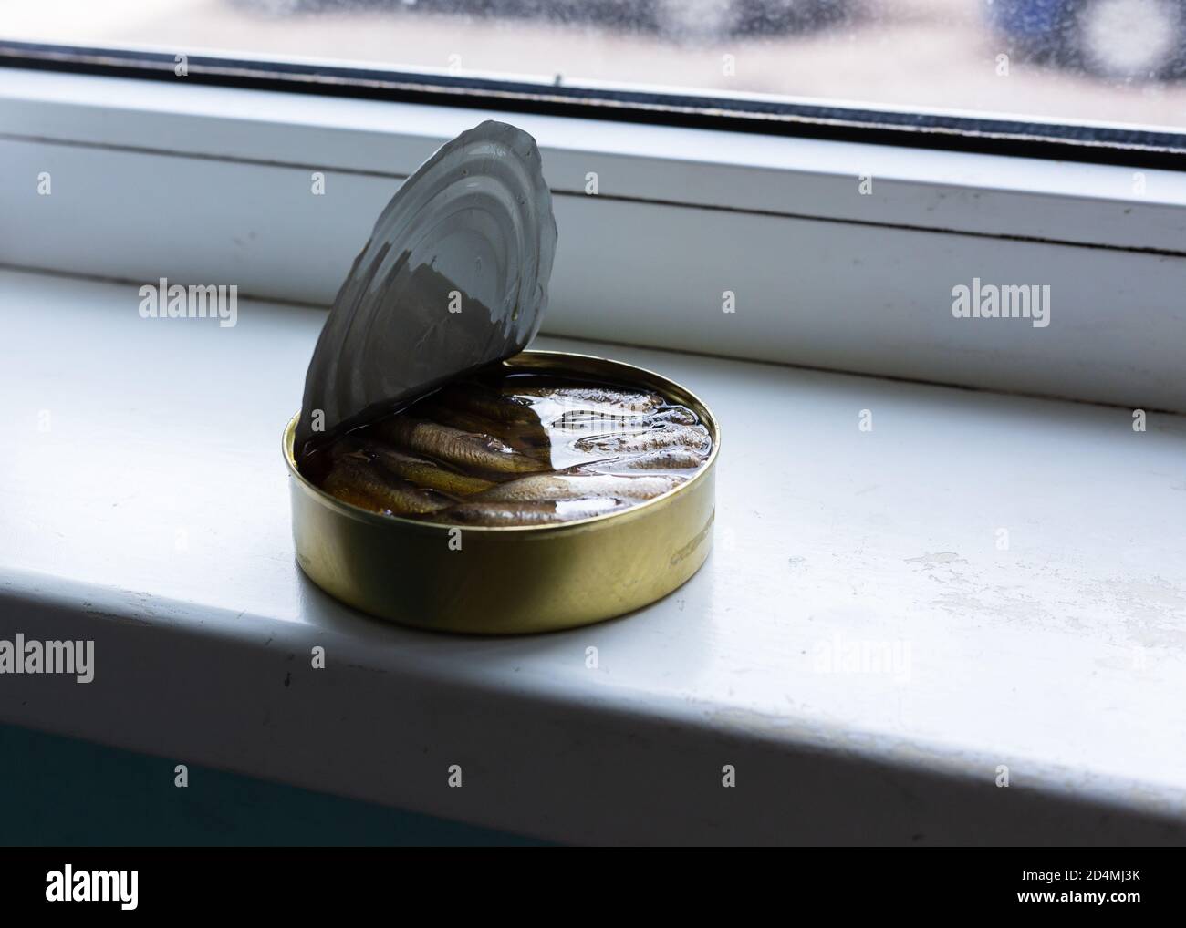 Opened tin of canned fish Stock Photo - Alamy