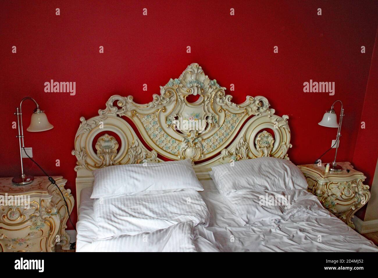 Ornate bed in a hotel room in Hamburg, Germany Stock Photo - Alamy