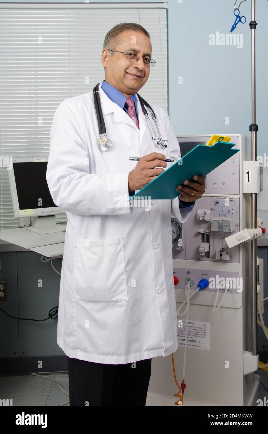 Doctor poses for photos Stock Photo - Alamy