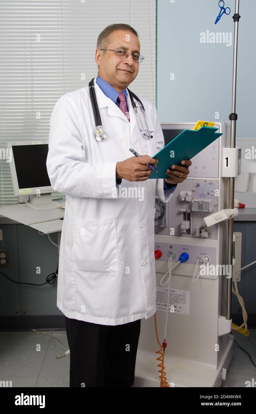 Doctor poses for photos Stock Photo - Alamy