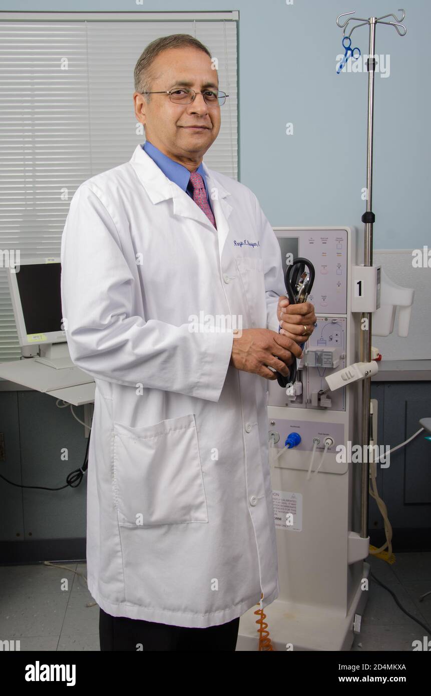 Doctor poses for photos Stock Photo - Alamy