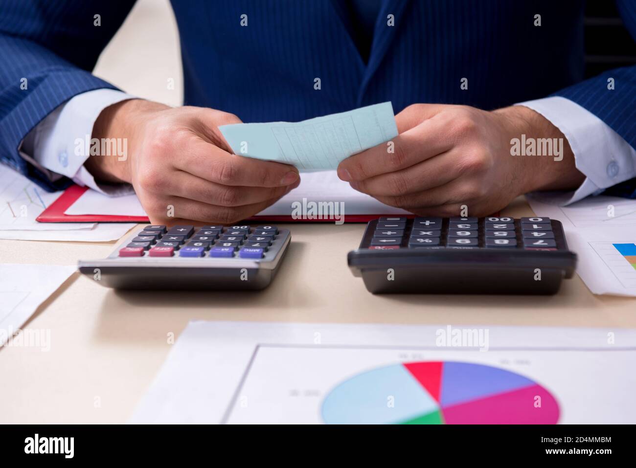 Young financial manager in the office Stock Photo - Alamy