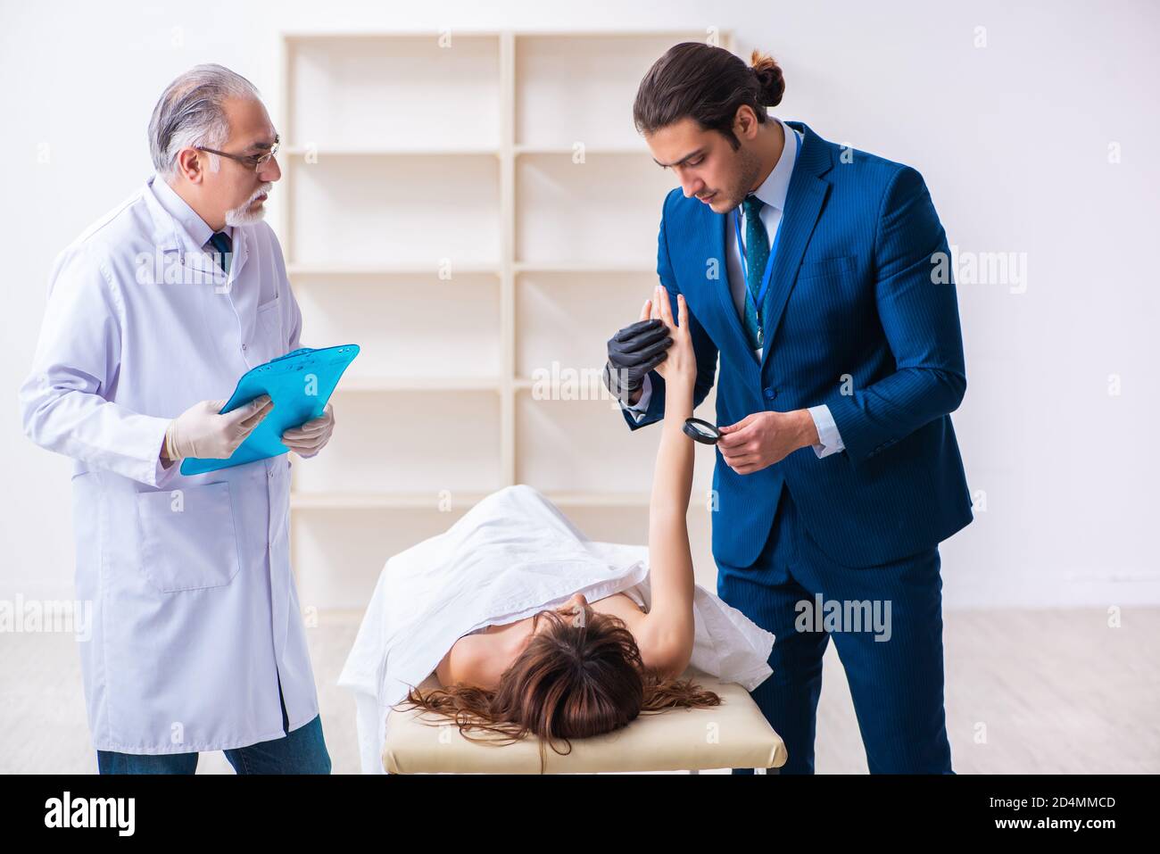 Police coroner examining dead body corpse in the morgue Stock Photo - Alamy