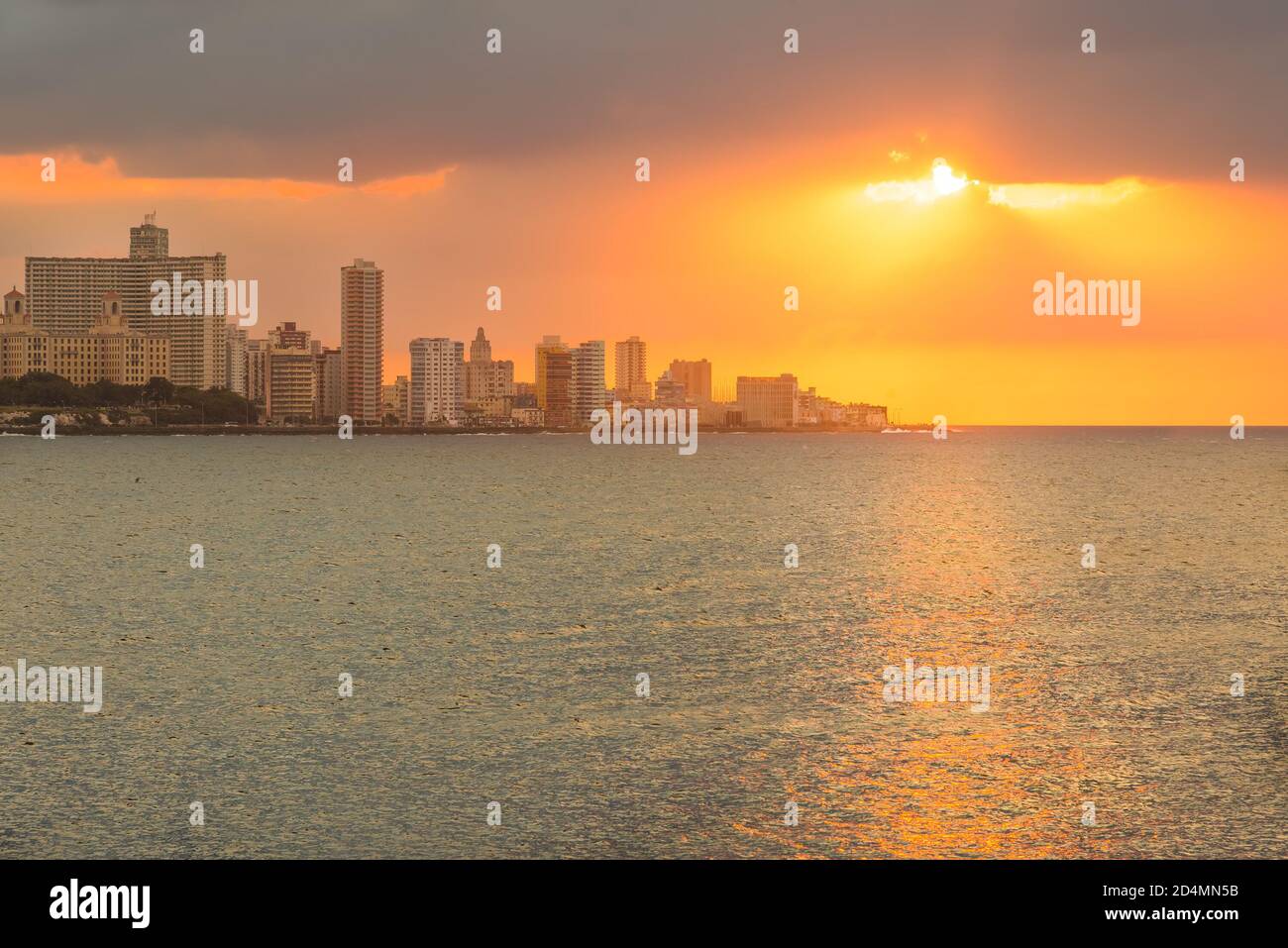 Sunset in Havana with a view of the city skyline and the ocean Stock ...