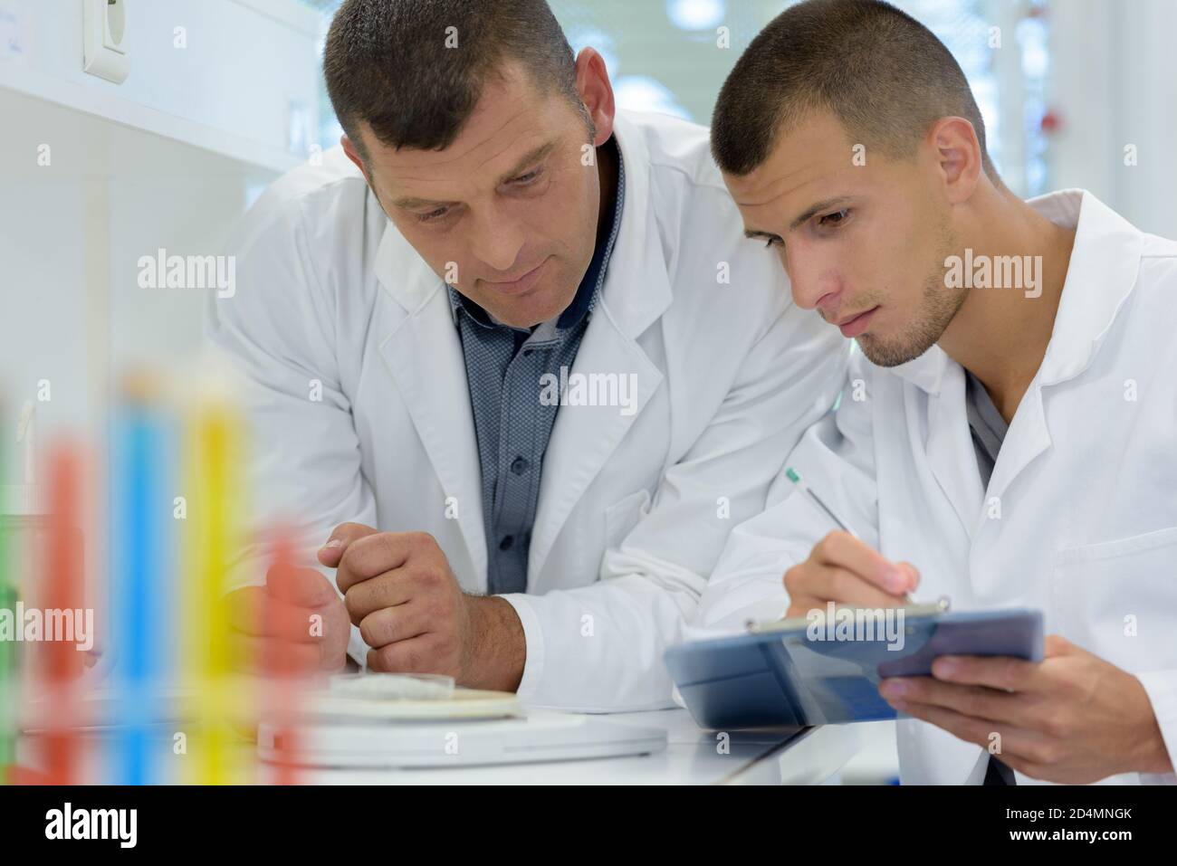 a science teacher with student Stock Photo - Alamy