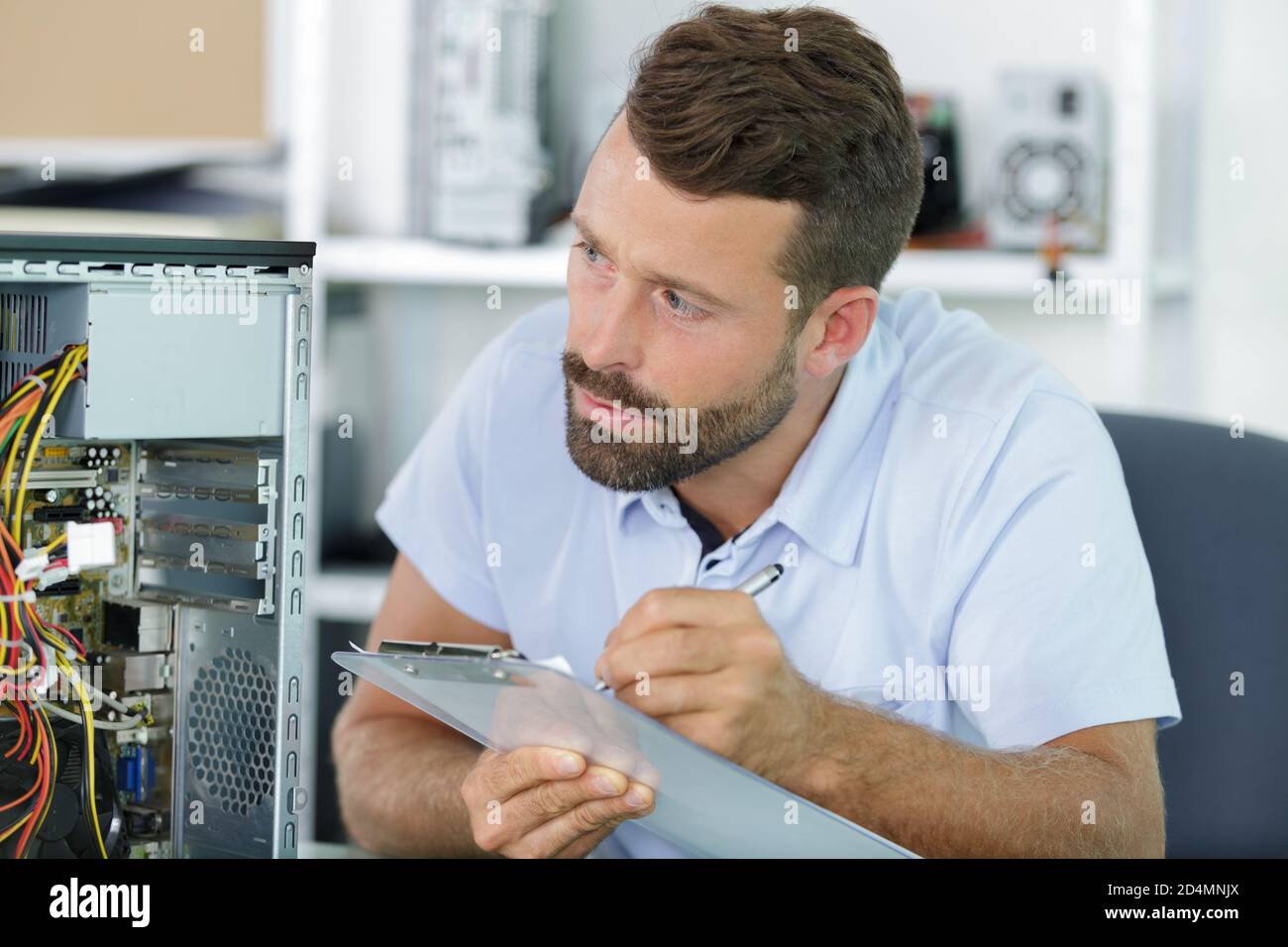 young engineer working with pc Stock Photo - Alamy
