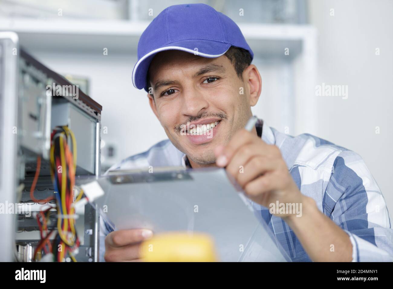a male professional computer service Stock Photo - Alamy