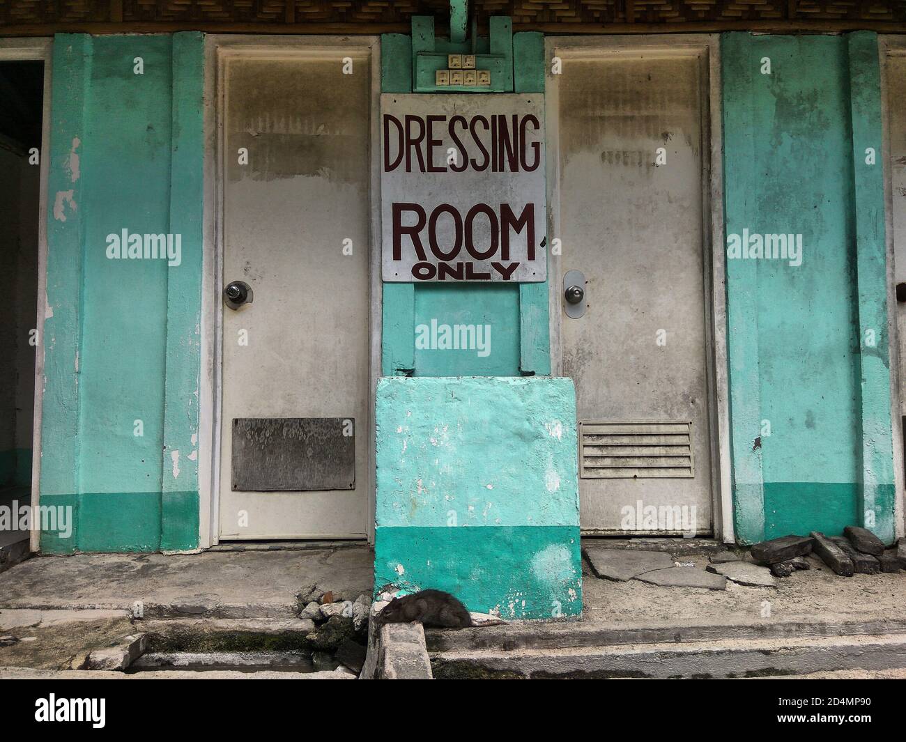 Dressing room only sign near two weathered doors Stock Photo - Alamy