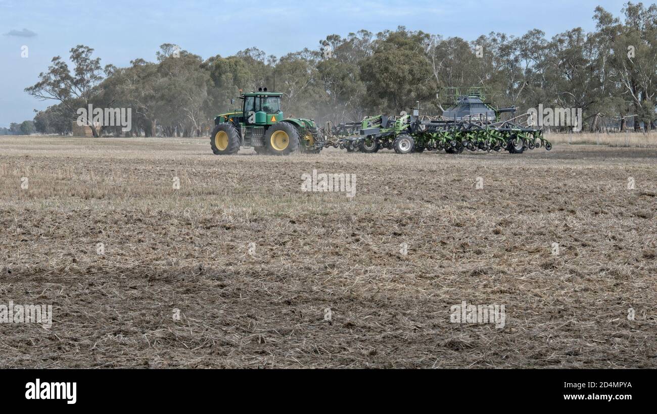 Devenish, Victoria / Australia - March 30 2020: Air seeder seeding a ...